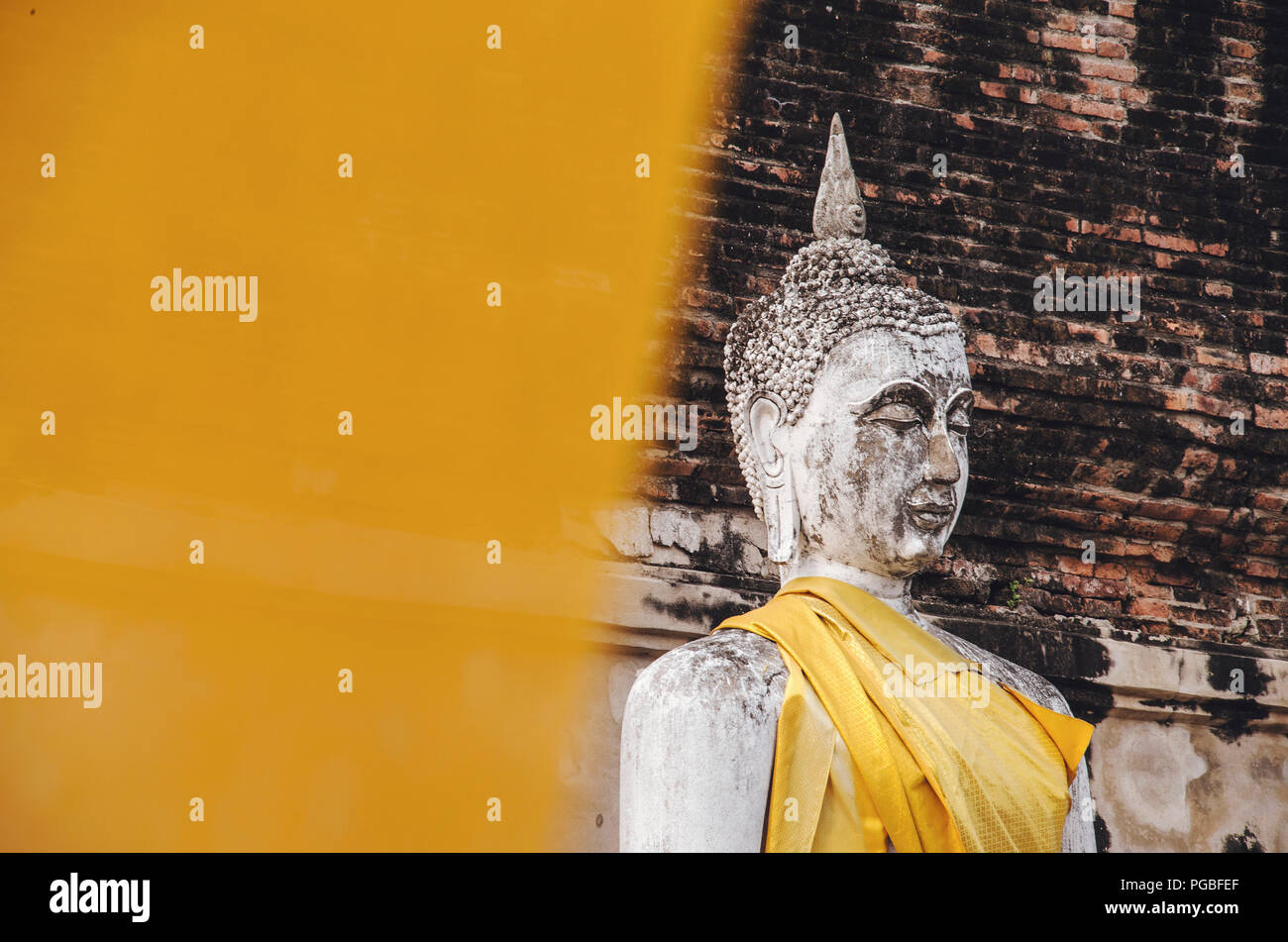 Carved stone Buddha statue; wat/temple complex in old Siam kingdom ...