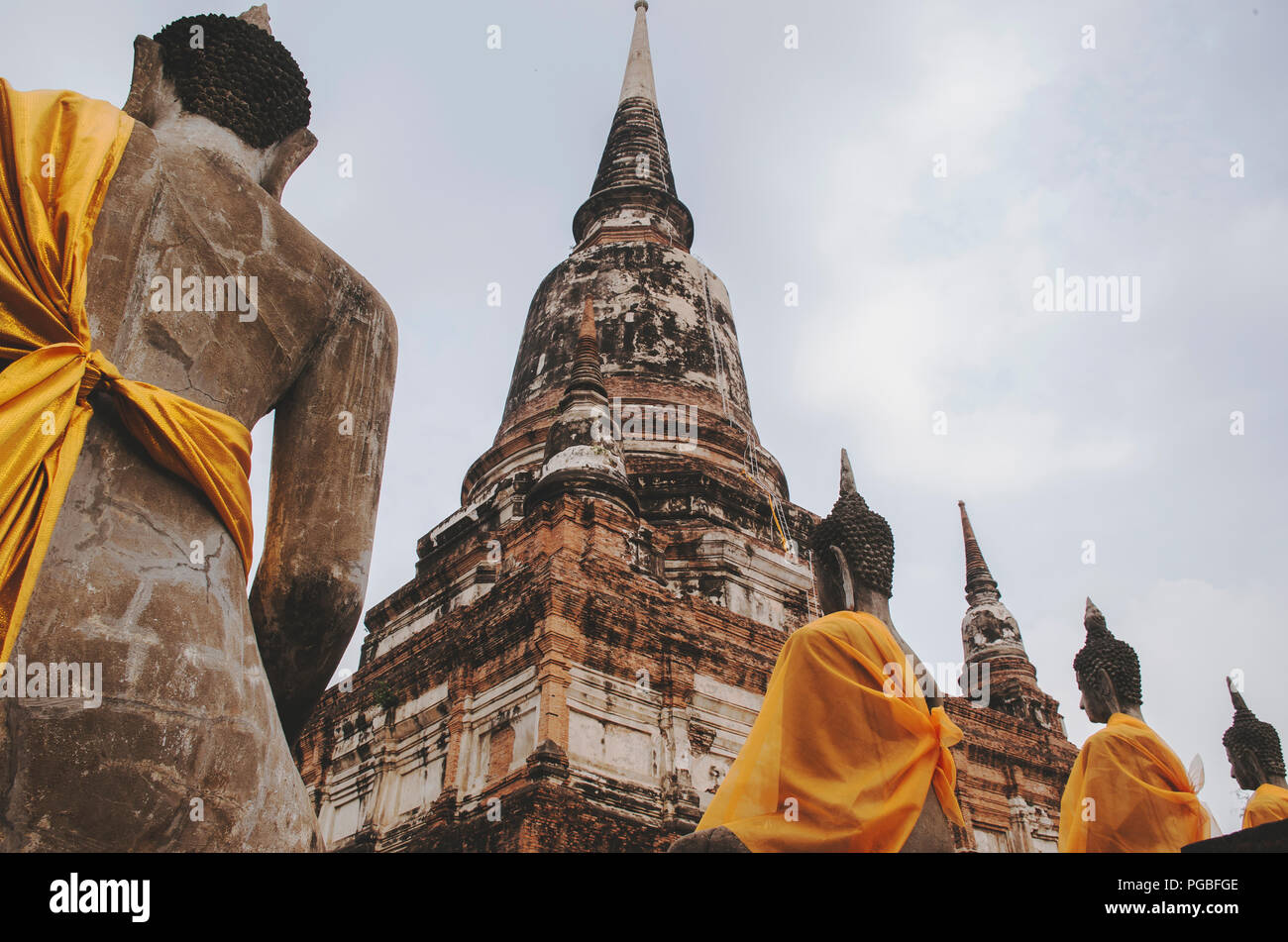 Carved stone Buddha statue; wat/temple complex in old Siam kingdom ...