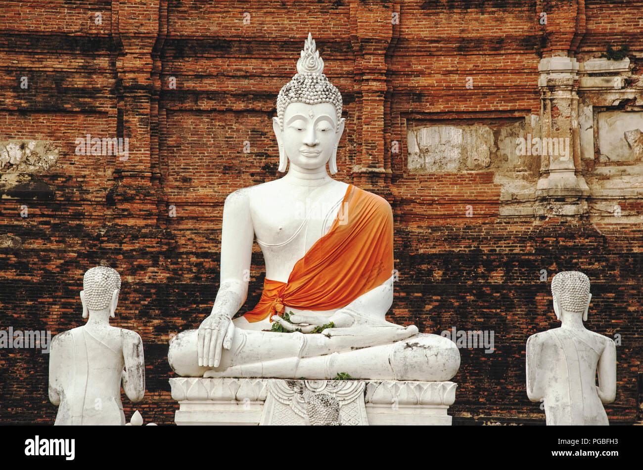 Carved stone Buddha statue; wat/temple complex in old Siam kingdom ...