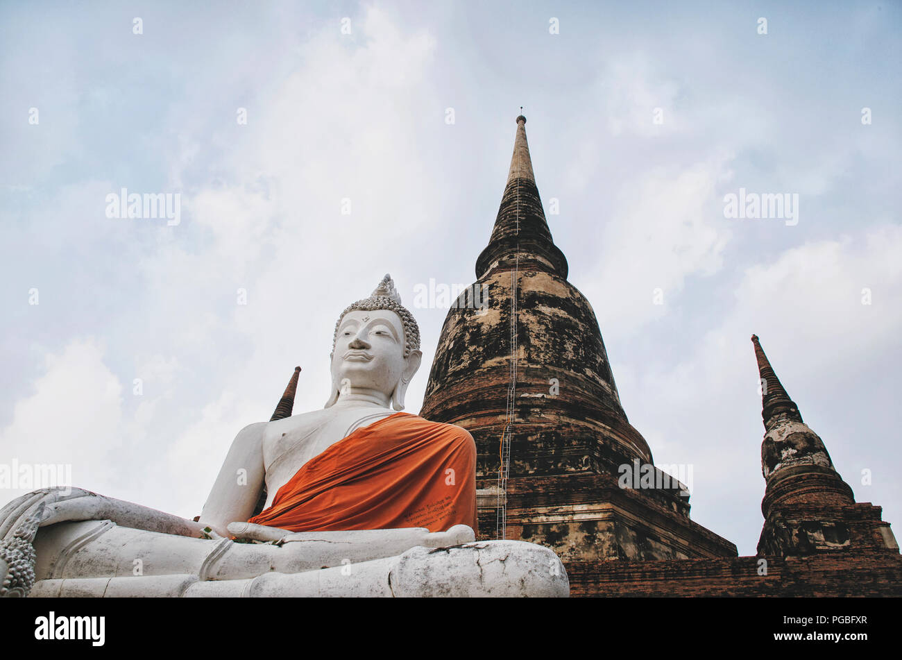 Carved stone Buddha statue; wat/temple complex in old Siam kingdom ...