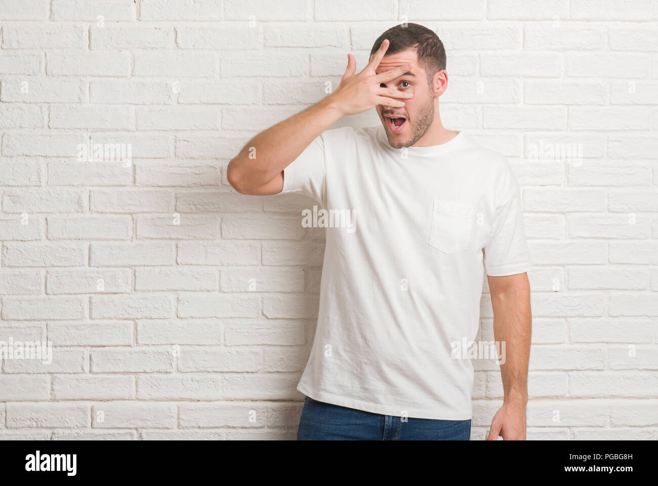 Man Peeking Over Wall High Resolution Stock Photography and Images - Alamy
