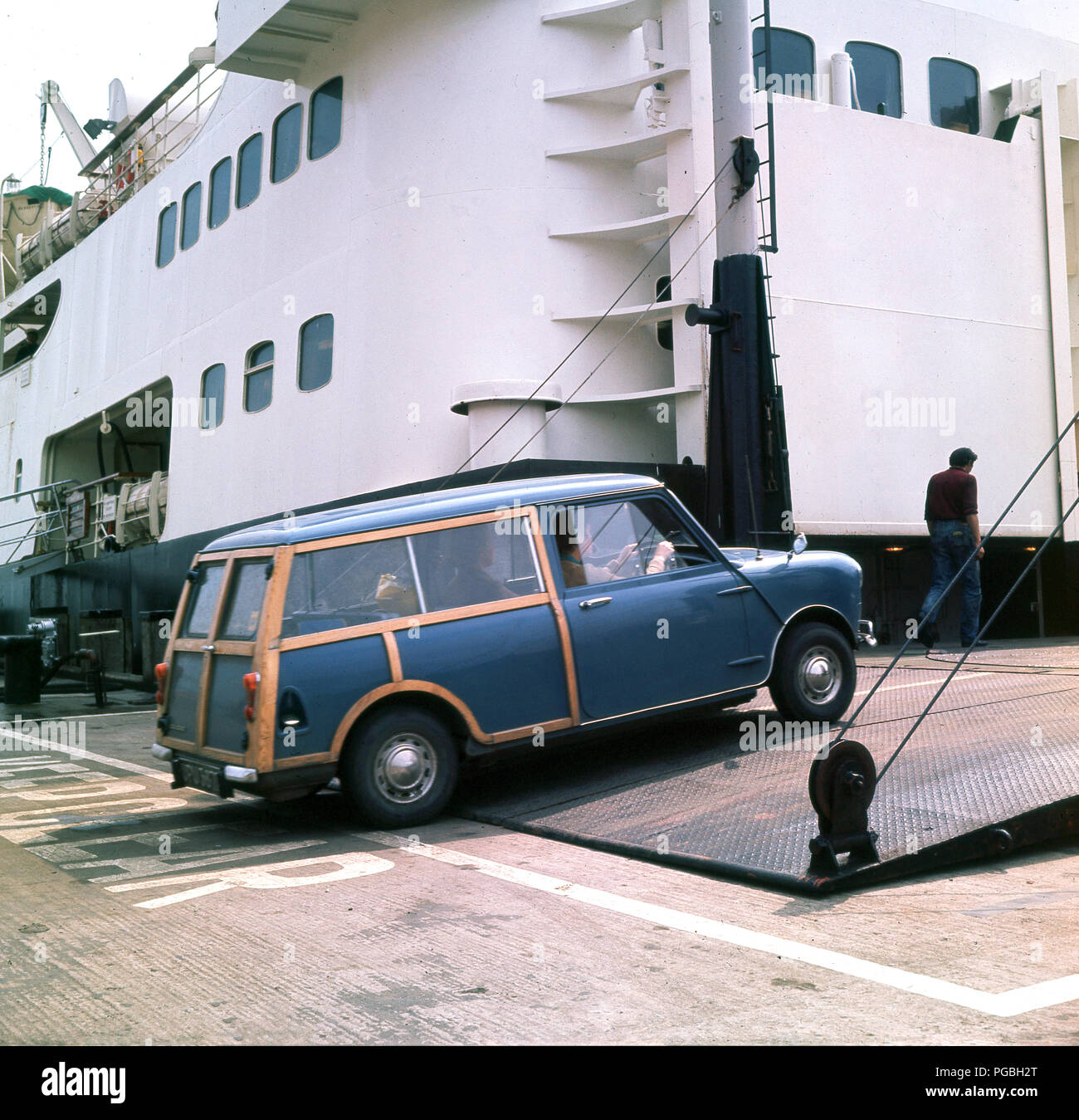 1968, Austin mini minor traveller car boarding a sea ferry, Scottish ...