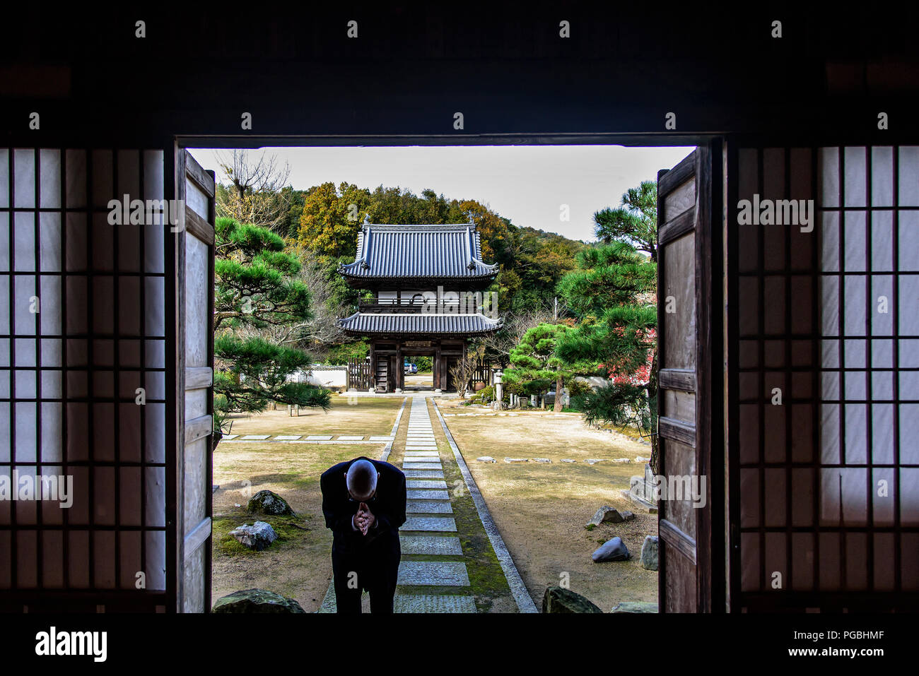 Okayama, Japan: The Japanese Buddhist follower is praying in front of ...