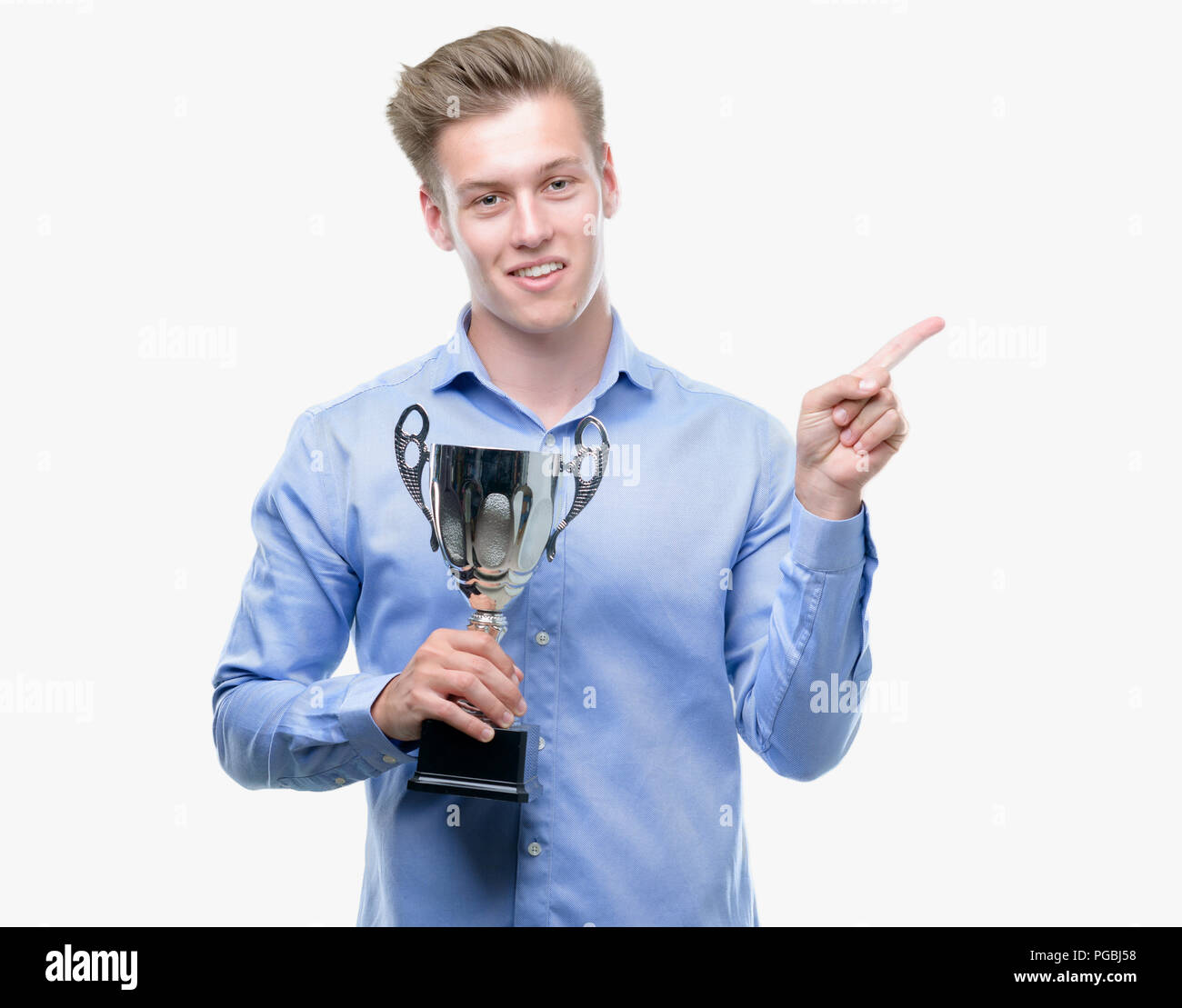Boy holding up a trophy hi-res stock photography and images - Alamy