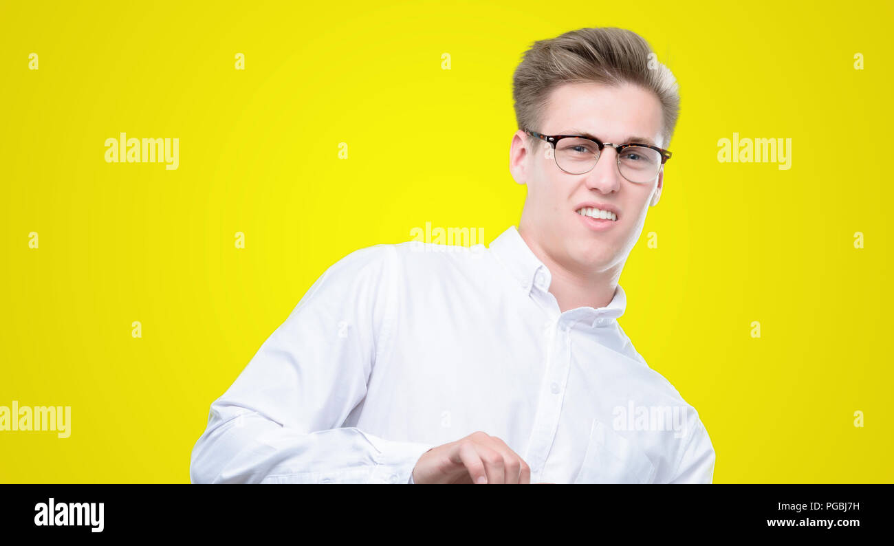 Young handsome blond man disgusted expression, displeased and fearful ...