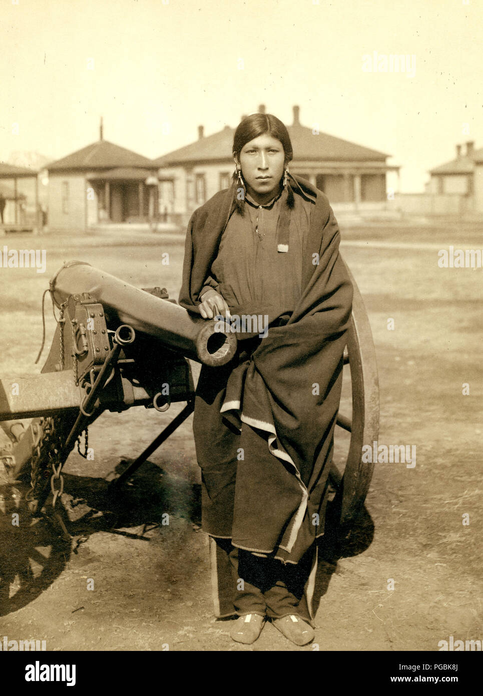 Plenty Horses, Oglala man, full-length portrait, facing front, with a ...