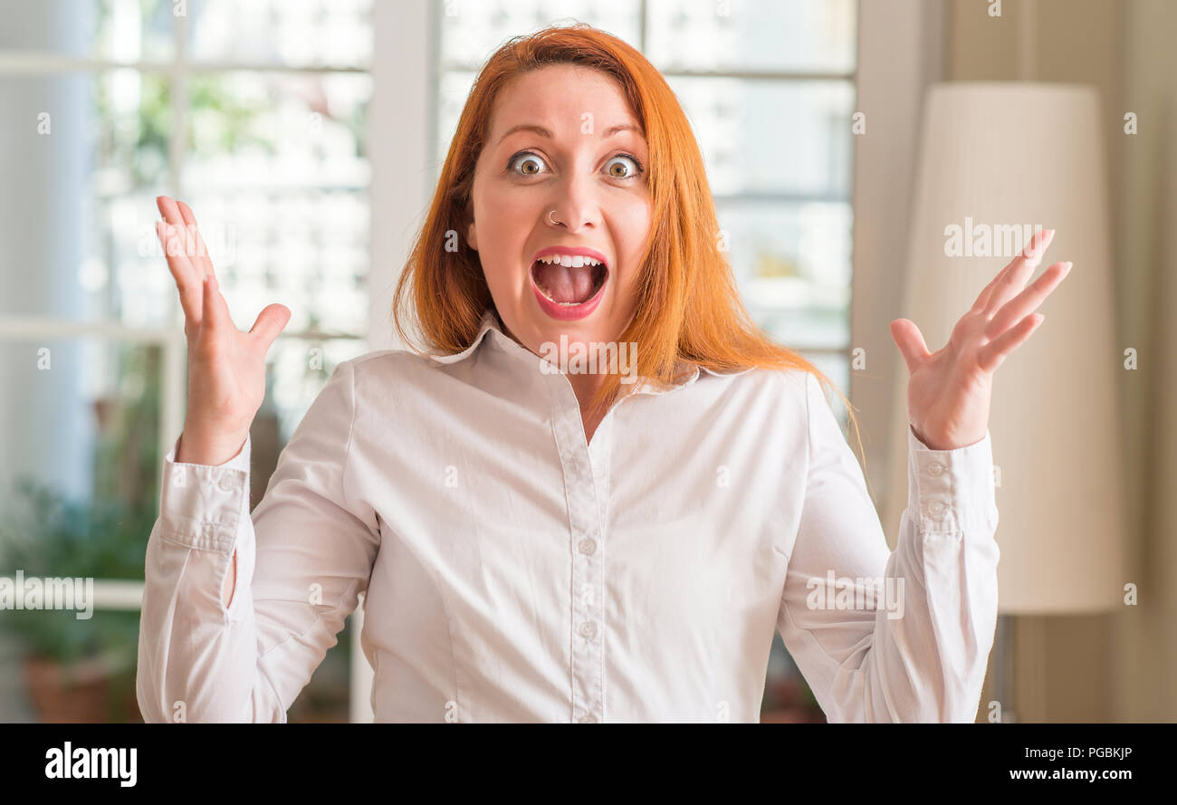 Screaming happy ginger woman hi-res stock photography and images - Alamy