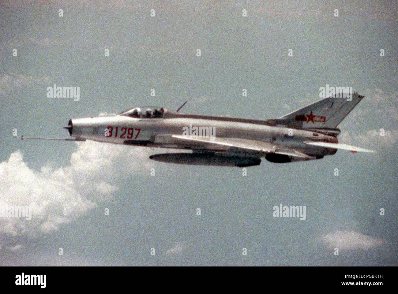 In flight air-to-air left front view of a People's Republic of China ...