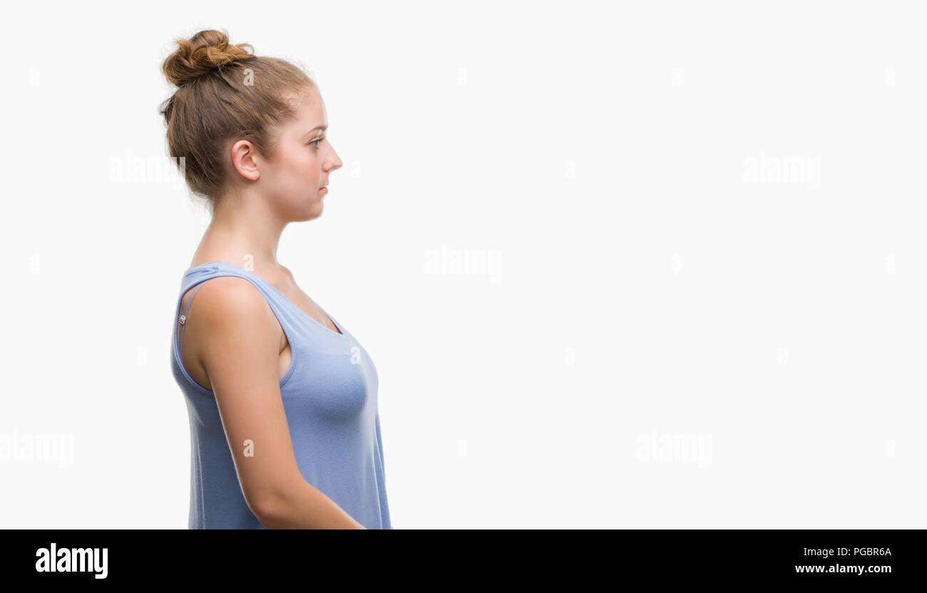 Young blonde woman looking to side, relax profile pose with natural ...