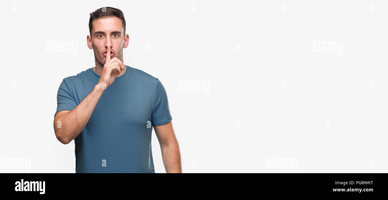 Hispanic man finger lips Cut Out Stock Images & Pictures - Alamy