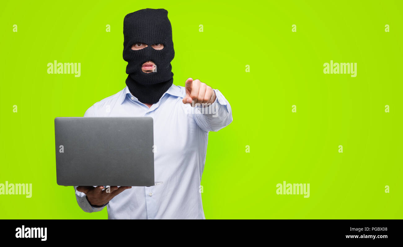 Hacker pointing finger at camera hi-res stock photography and images ...