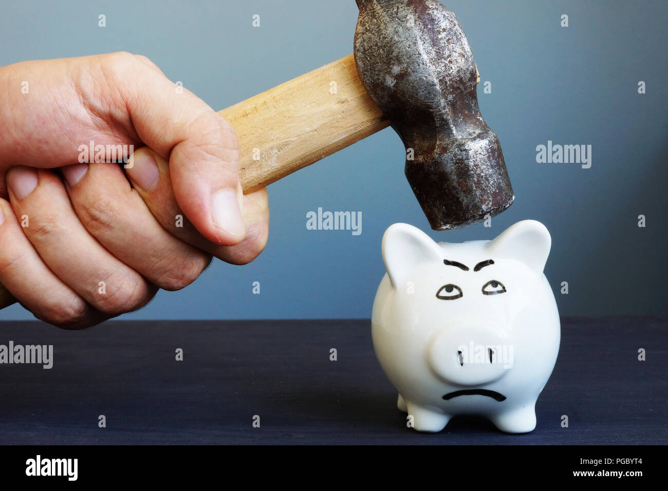 Breaking A Piggy Bank High Resolution Stock Photography and Images - Alamy