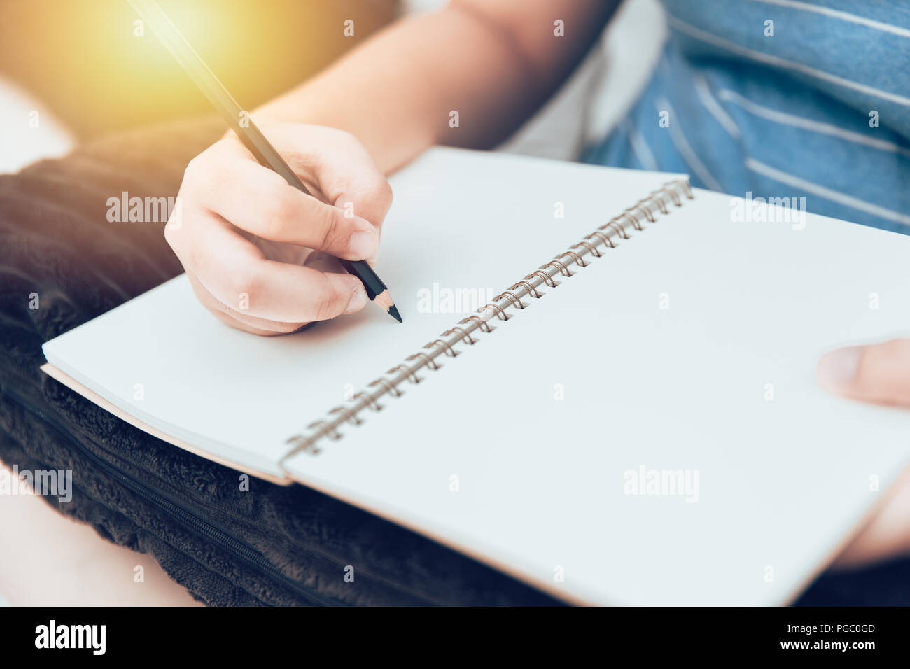 girl hand writing note blank book with pencil Stock Photo - Alamy