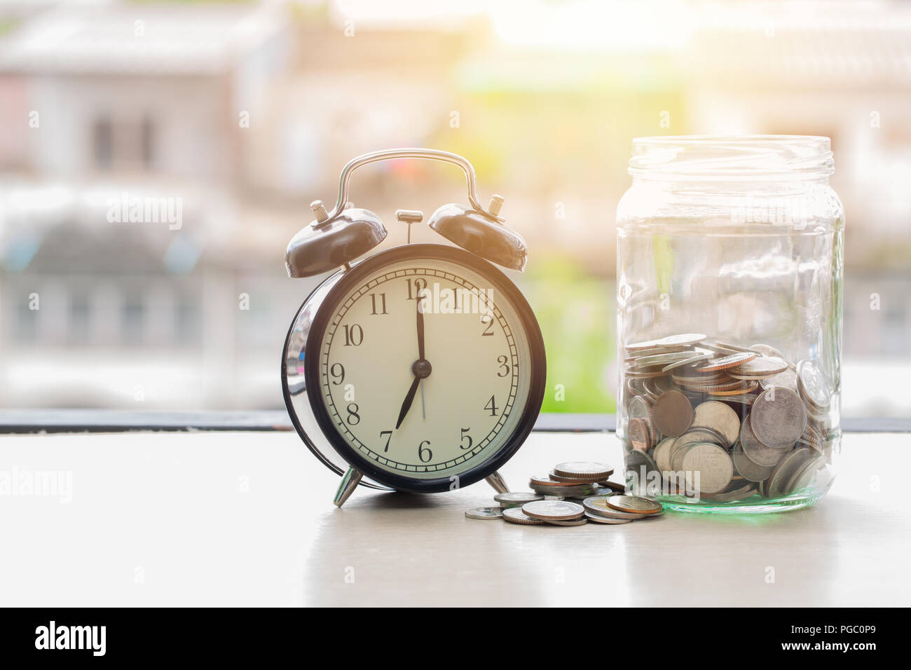 time to saving money for future everyday concept Stock Photo - Alamy