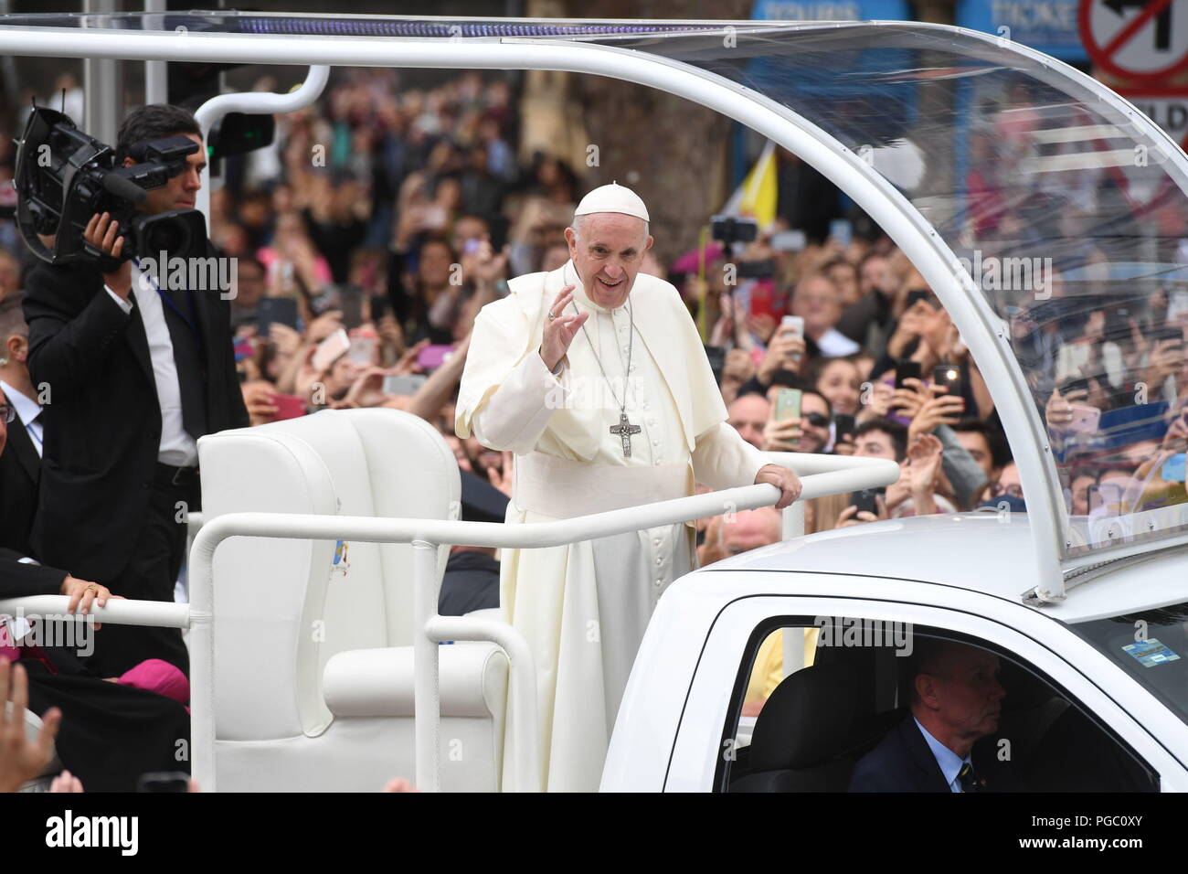 Pope Francis waves to the waiting crowds on College Green, Dublin, as ...