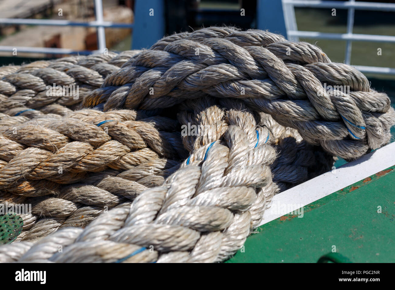 twisted ship's rope lying on the deck Stock Photo - Alamy