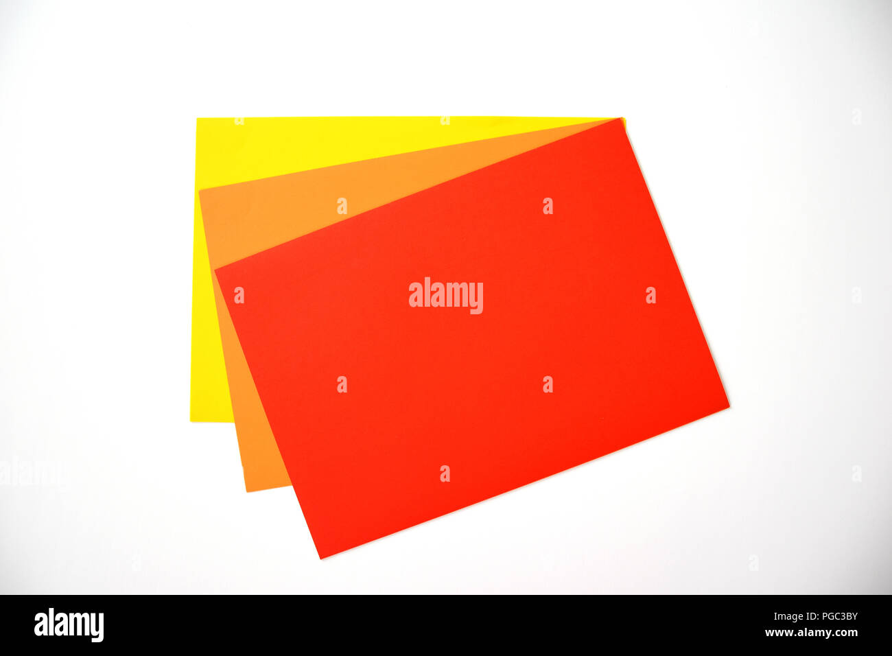 Colored a4 on white background red color Stock Photo - Alamy