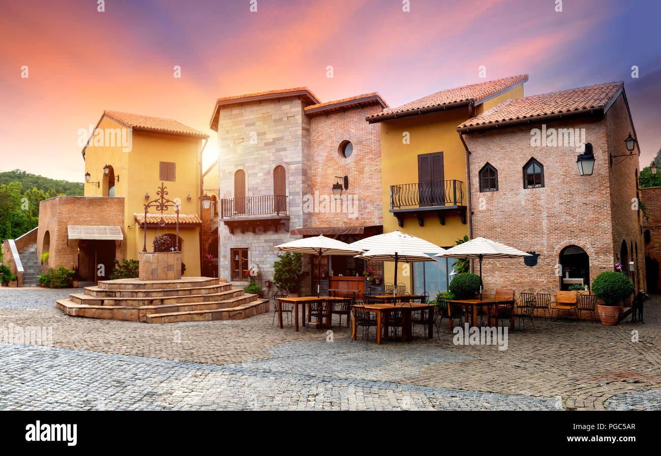 Old Italian village style building in morning sun lighting Stock Photo ...