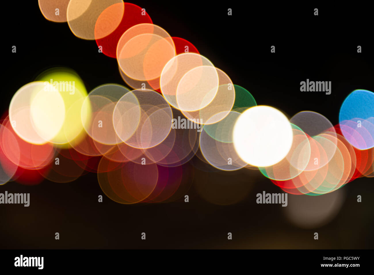 Overlap color circle of bokeh from night lighting Stock Photo - Alamy