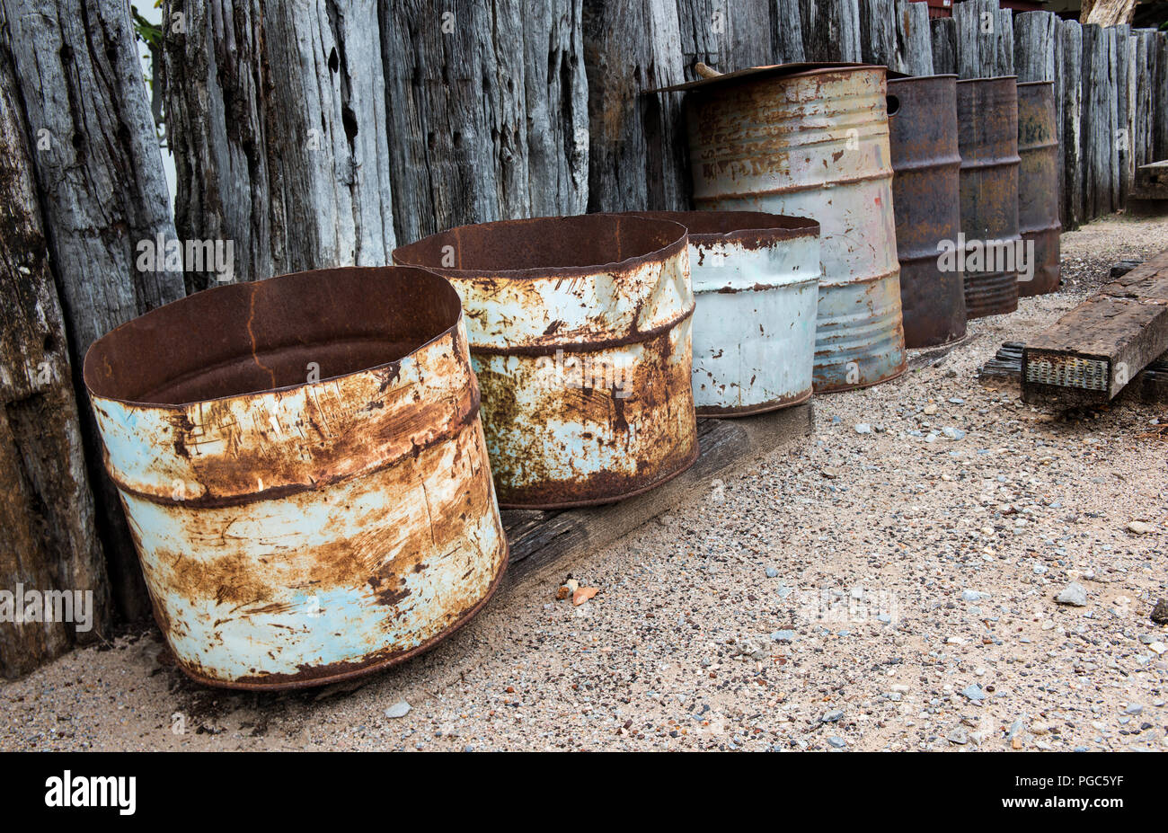 Recycle and reuse old oil barrel iron tank Stock Photo - Alamy