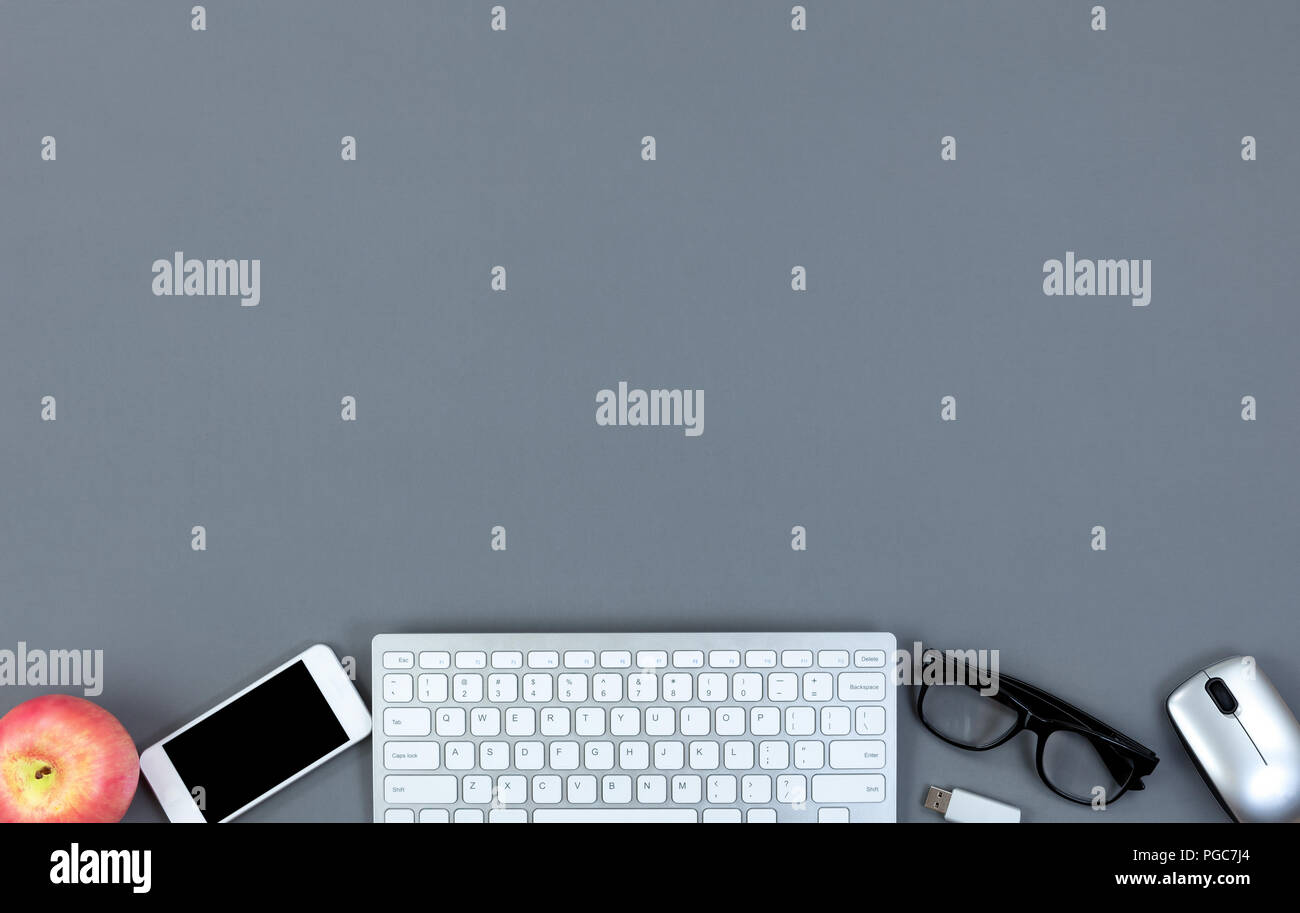 gray office desktop with technology and copy space Stock Photo - Alamy