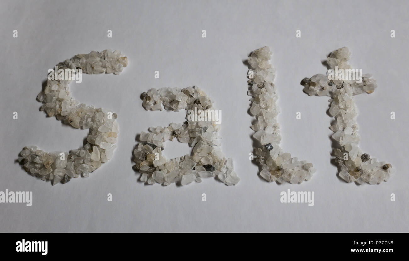 Written with coarse salt for winter service the word salt Stock Photo ...