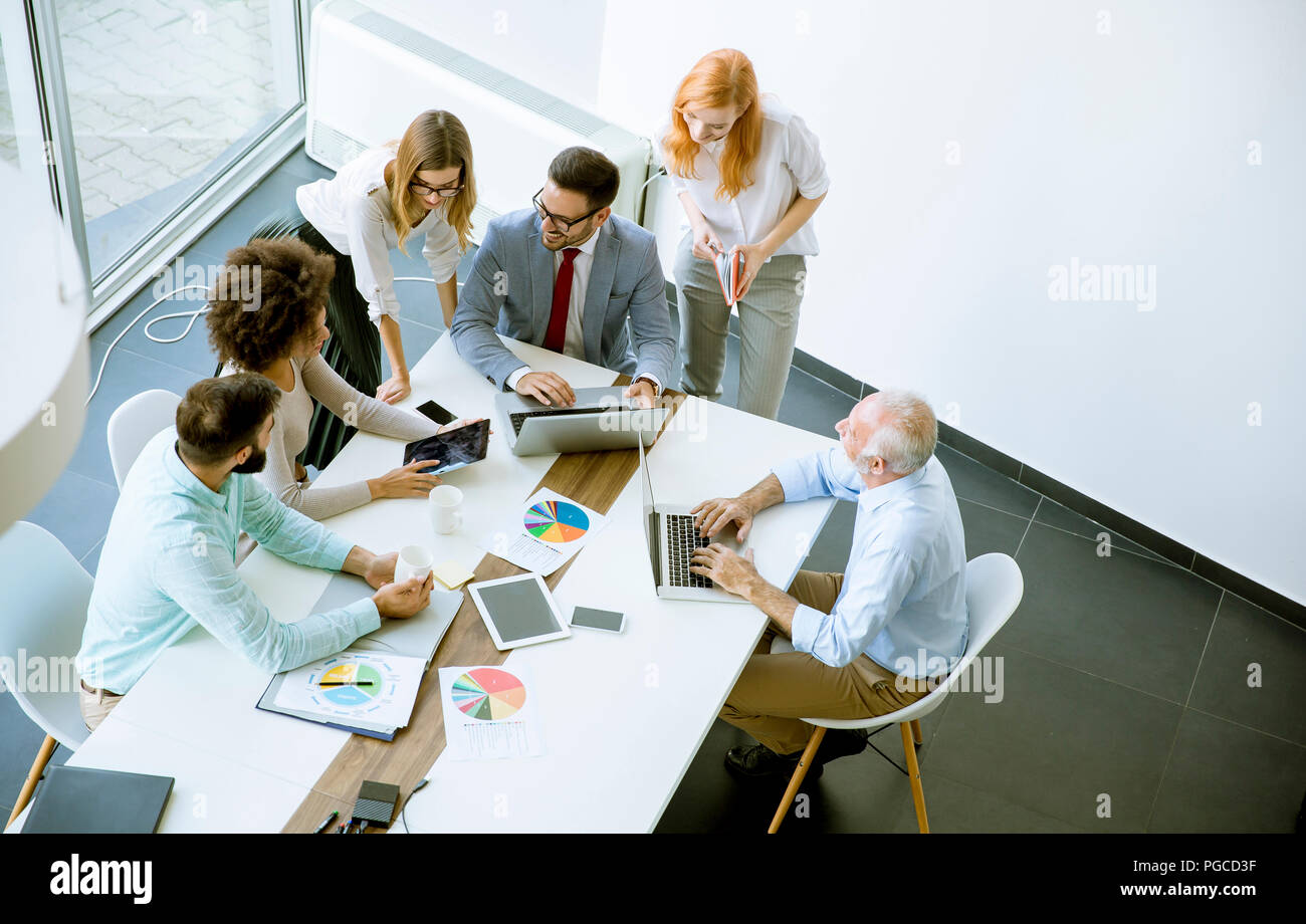 Top view at business people working in office Stock Photo - Alamy