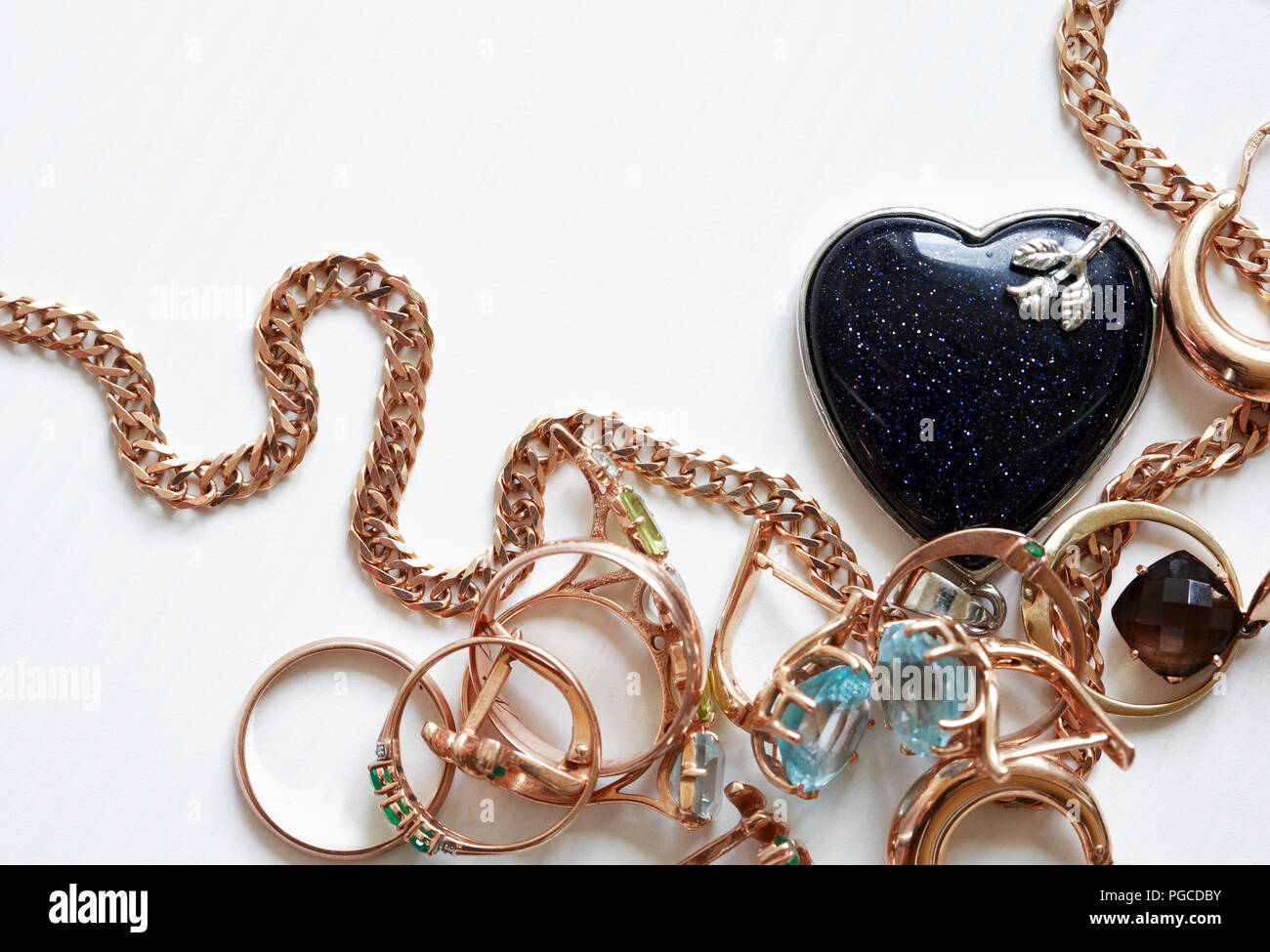 Set of various jewelry adornments on white background with free space ...