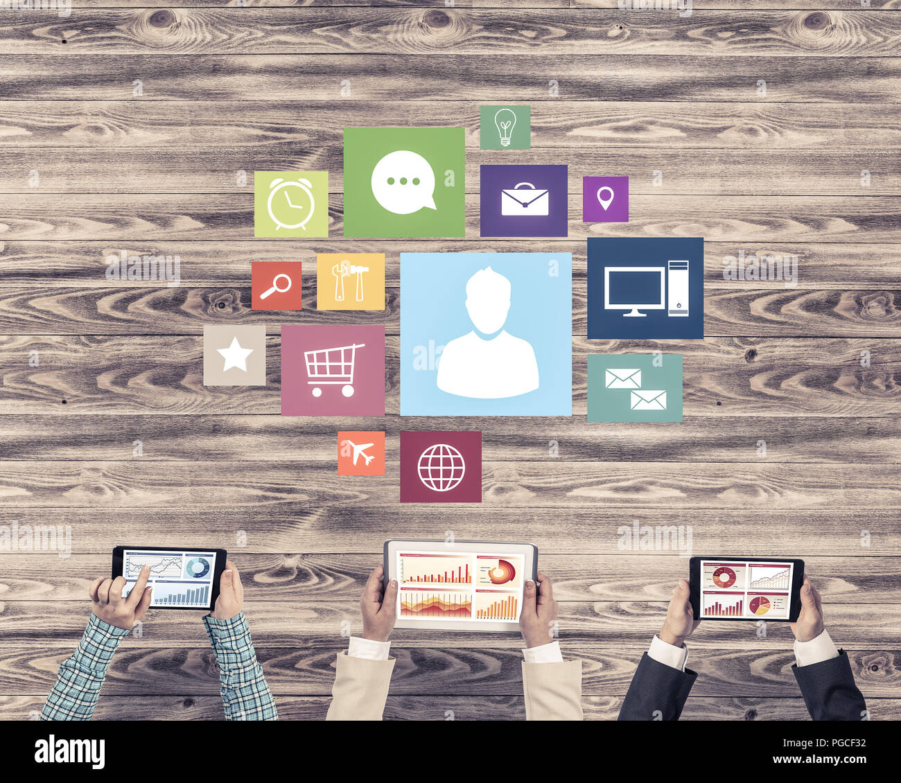 Top view of businesspeople sitting at table and using gadgets Stock ...