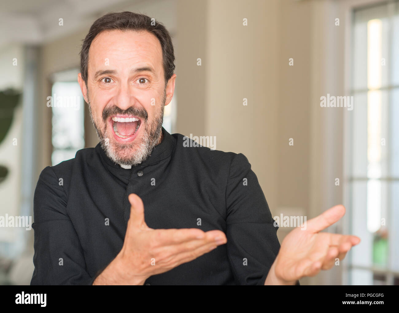 Priest man pointing hand hi-res stock photography and images - Alamy