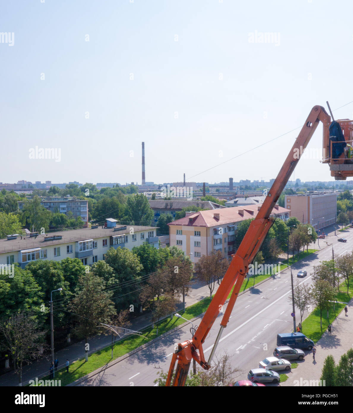 The city outdoor Factory chimneys and construction cradle Stock Photo ...