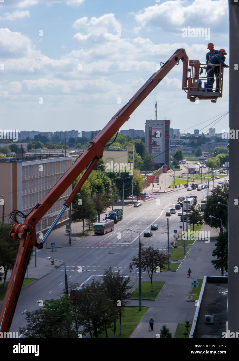 The city outdoor Factory chimneys and construction cradle Stock Photo ...