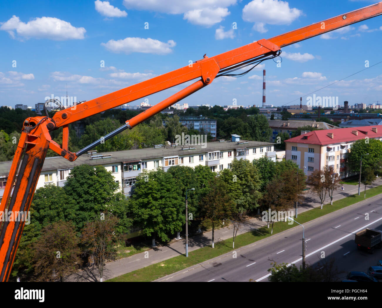 The city outdoor Factory chimneys and construction cradle Stock Photo ...