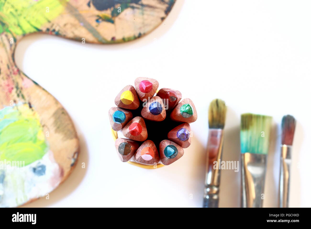 Tools for creativity, namely pencils, palette and brushes Stock Photo ...