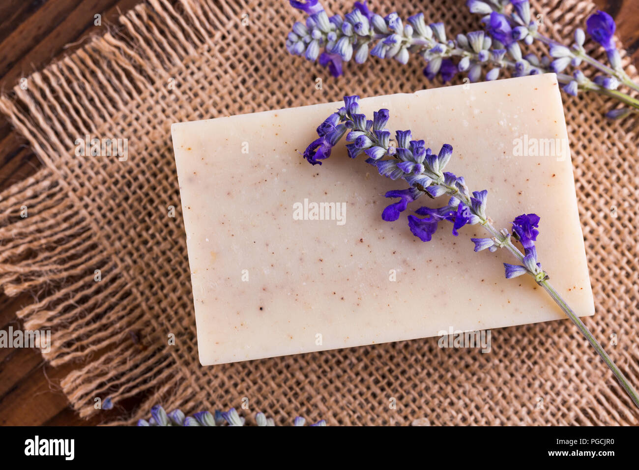 Closeup of handmade lavender soap on table Stock Photo - Alamy