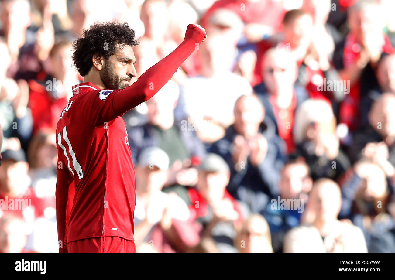 Liverpool's Mohamed Salah celebrates scoring his side's first goal of ...