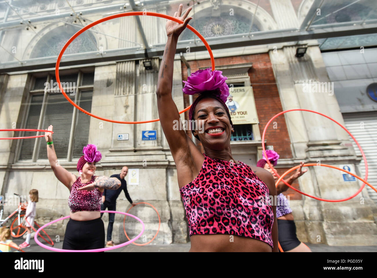 London, UK. 25 August 2018. Members of Marawa's Majorettes, a hula hoop ...
