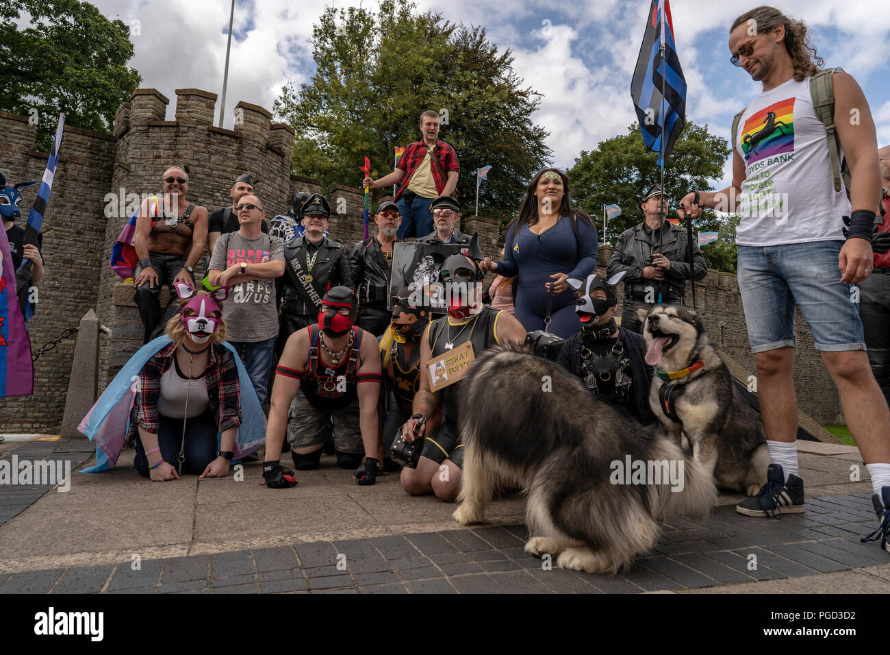 Cardiff, Wales, August 25, 2018: Spectators and march participants pose ...