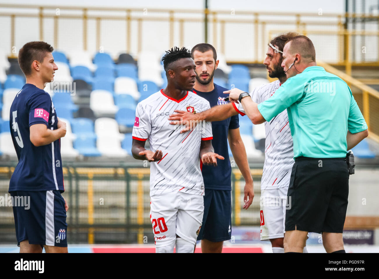 Footballer arguing with referee hi-res stock photography and images - Alamy