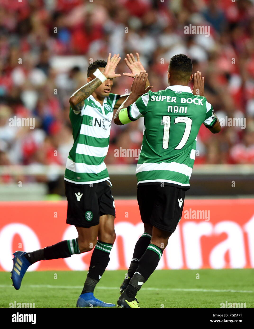 Lisbon, Portugal. 25th Aug, 2018. Nani (R) of Sporting celebrates with ...