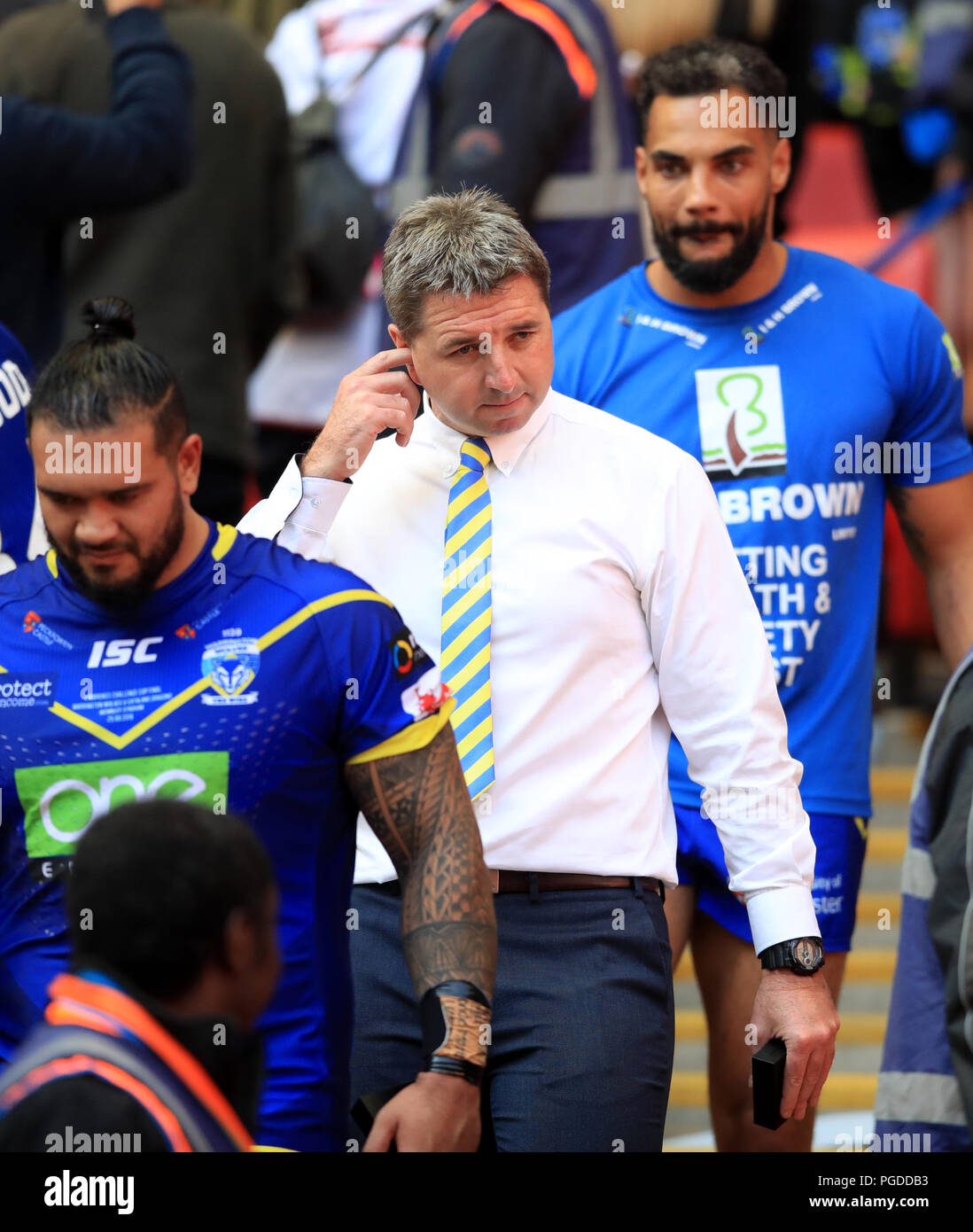 Warrington Wolves head coach Steve Price (centre) looks dejected after ...