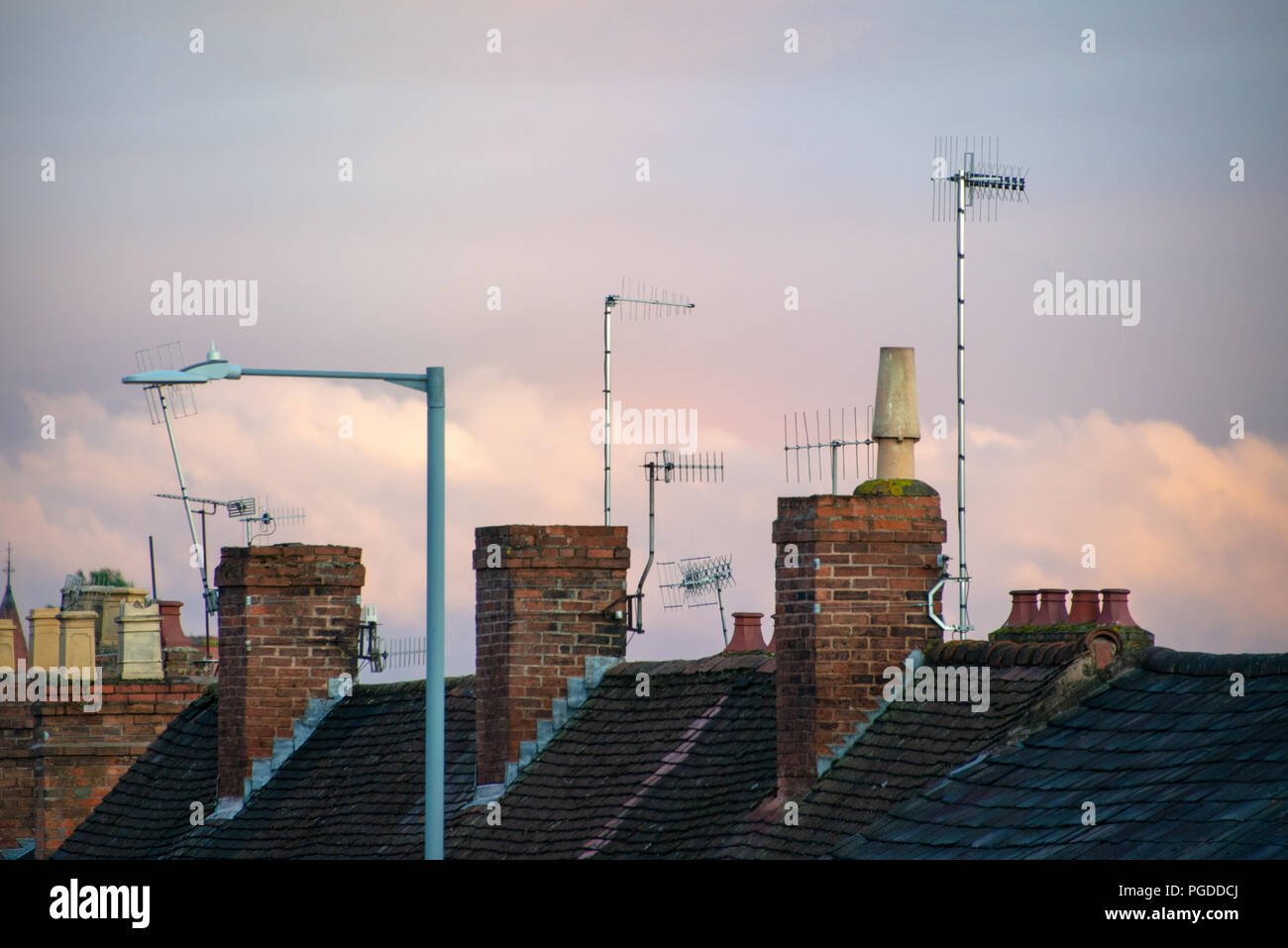 Typical and traditional English rooftop scent seen at twilight Stock ...
