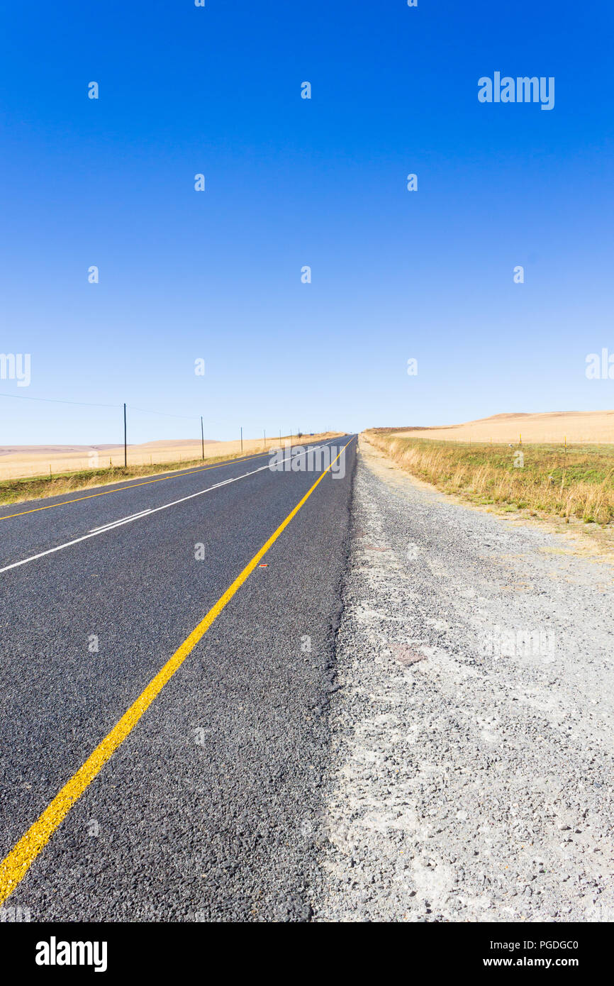 Perspective road view from South Africa along the road to Dragon's ...