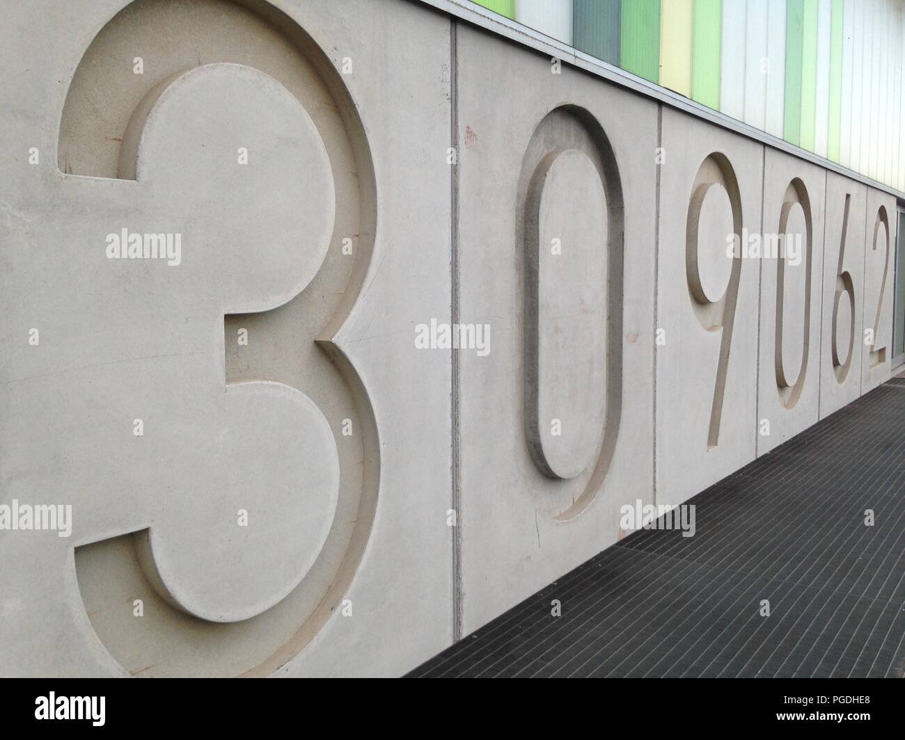 Address number on a concrete building exterior wall. Milan, Italy Stock ...