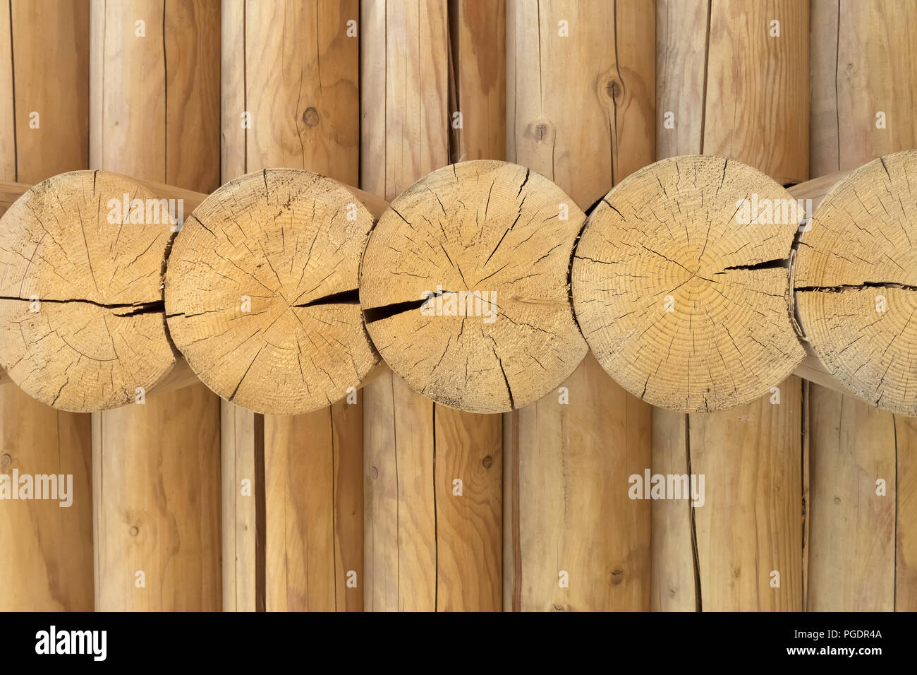 Part of the wall made of logs Stock Photo - Alamy