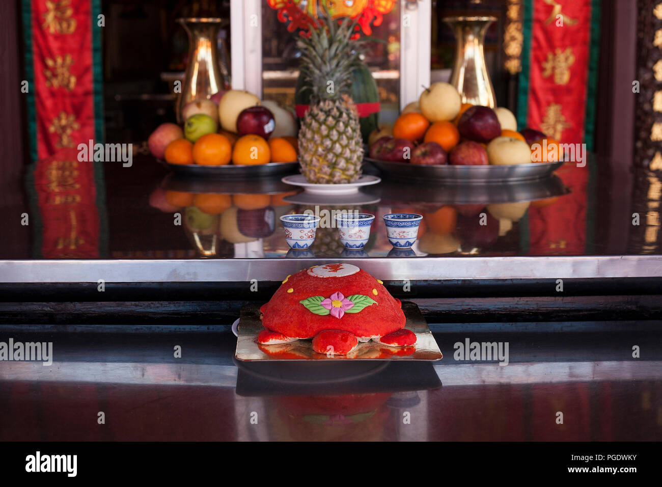 Offerings food in buddhist Temple, Thailand Stock Photo - Alamy