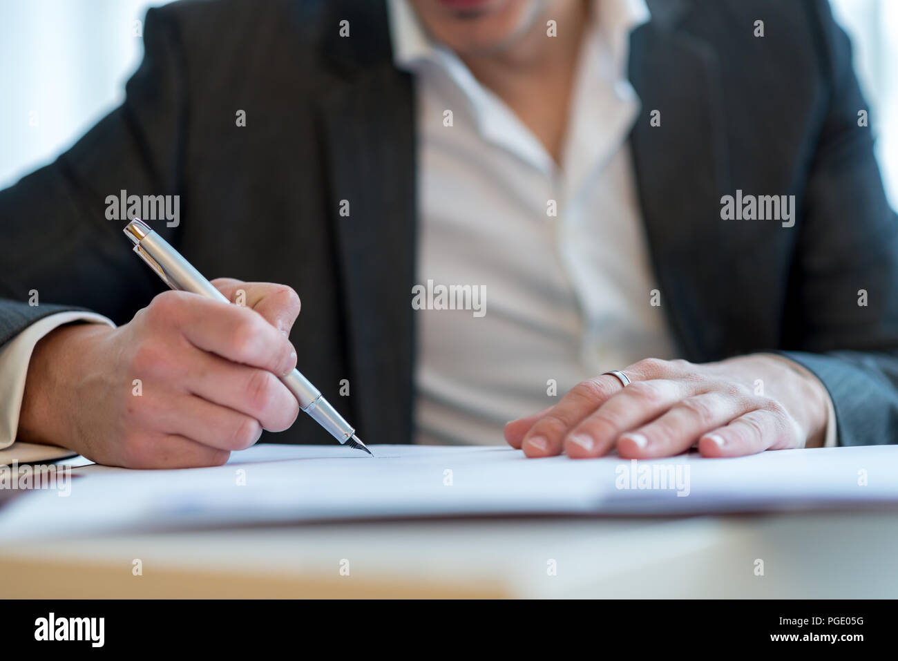 Man signing contact not woman not child hi-res stock photography and ...