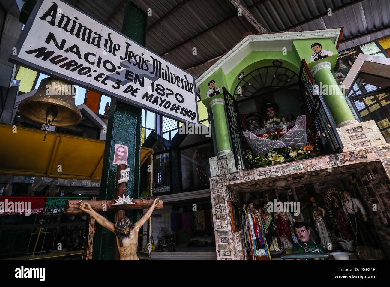 Altar in honor of Jesús Malverde who is revered as Saint who every day ...