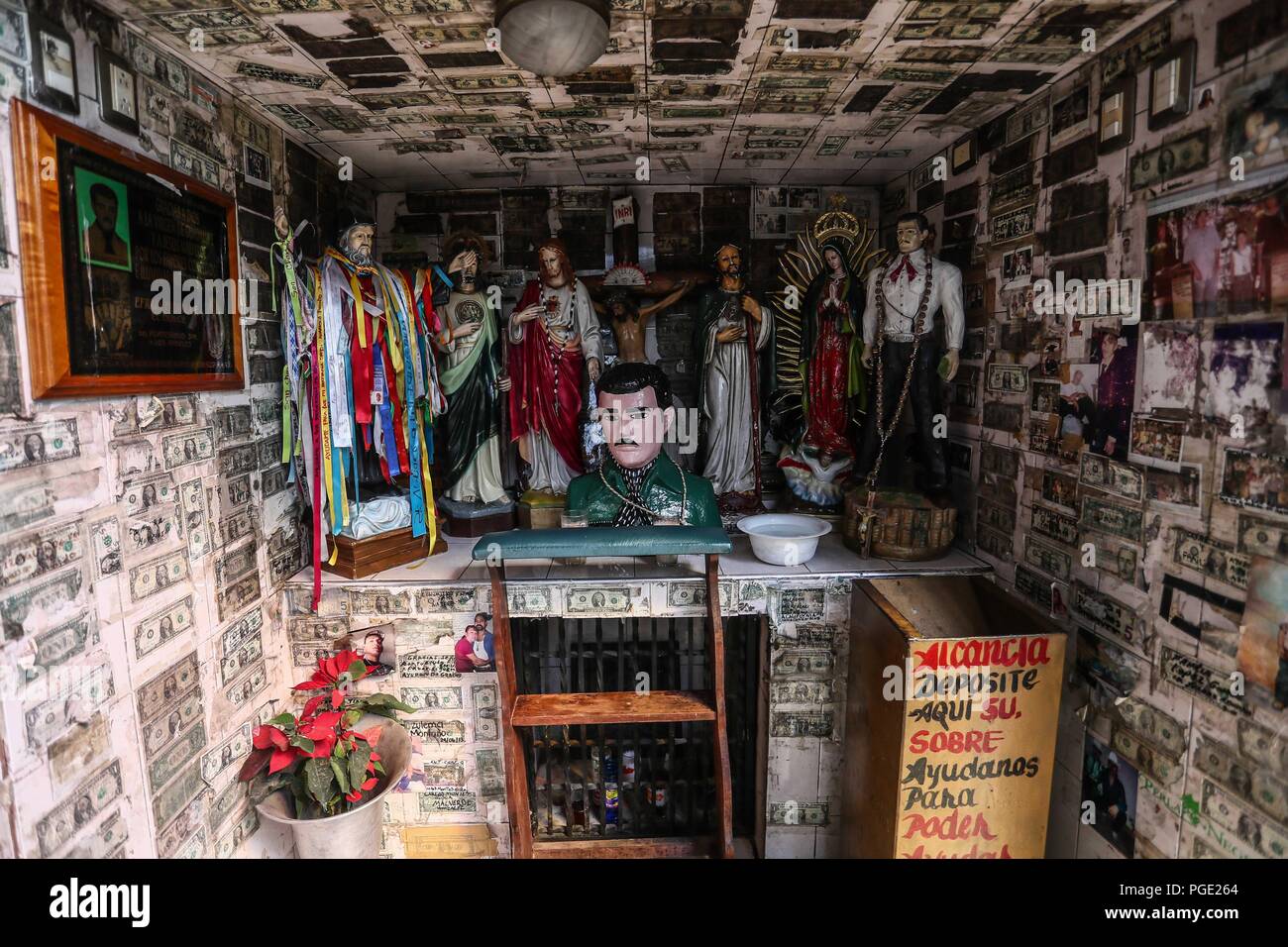 Altar in honor of Jesús Malverde who is revered as Saint who every day ...
