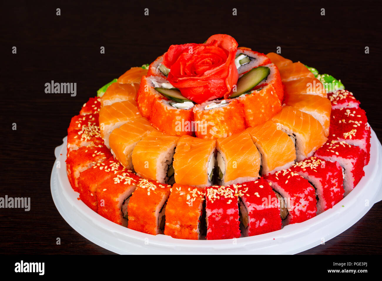 Philadelphia roll cake with salmon, crab and eel Stock Photo - Alamy